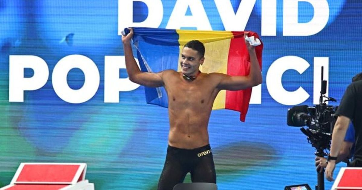 AUR PENTRU DAVID POPOVICI. Românul, campion mondial la 200 metri liber, la Campionatele Mondiale ...